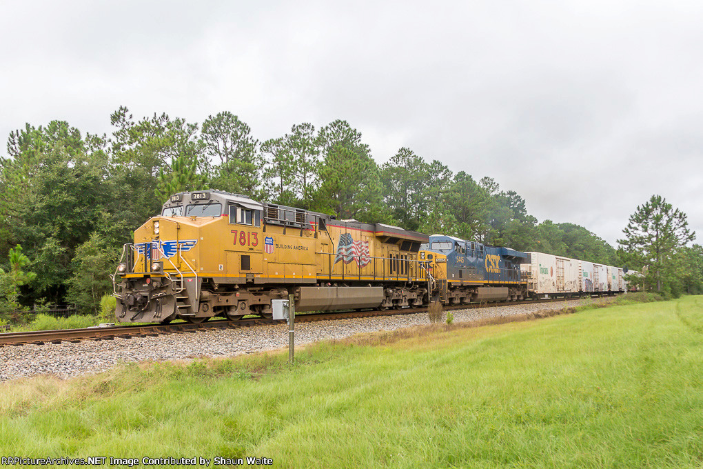 UP 7813 with a Juice Train